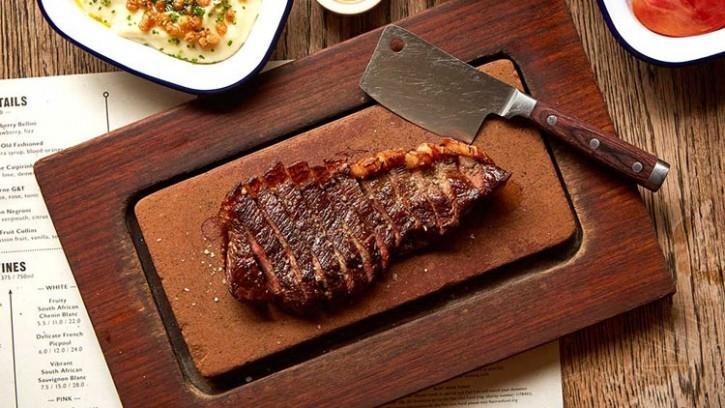 Gail’s backer plots rare move with bid for steak chain Flat Iron ...